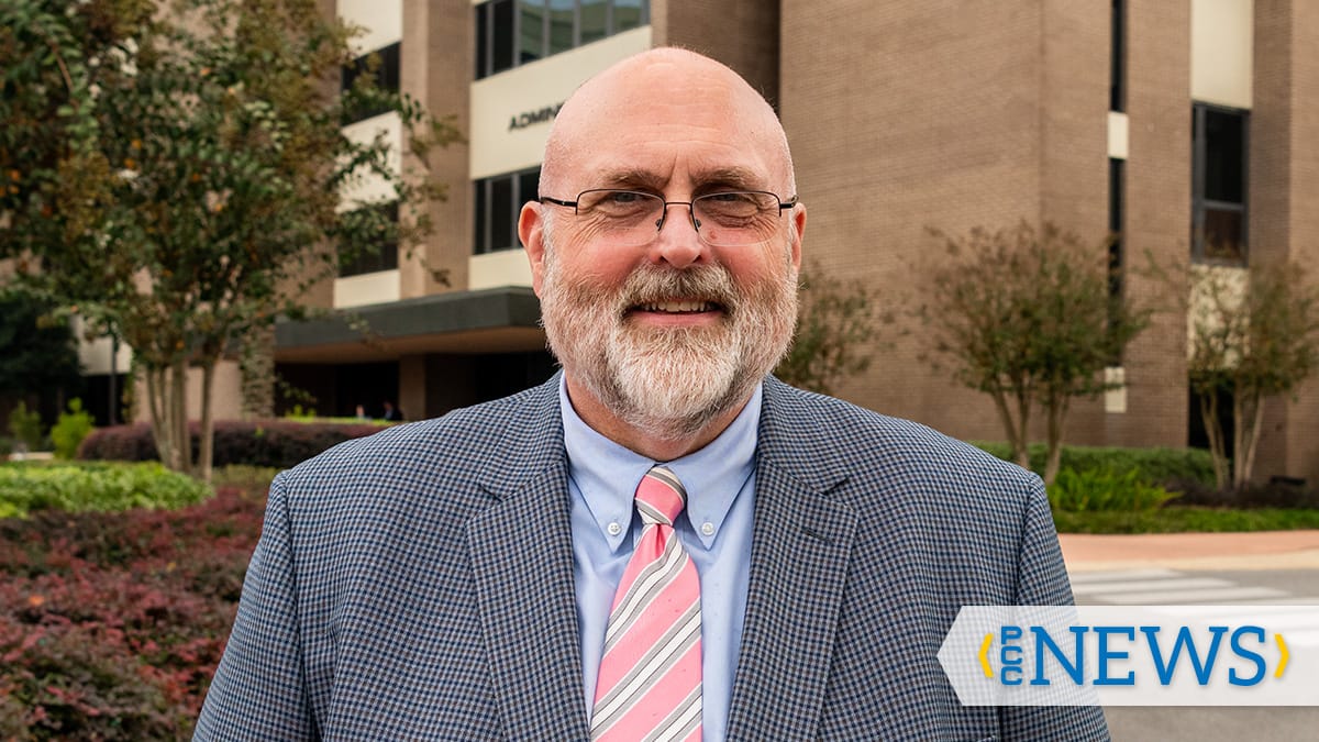 Dr. Jim White: Teaching Business and Pink Umbrellas • Pensacola ...